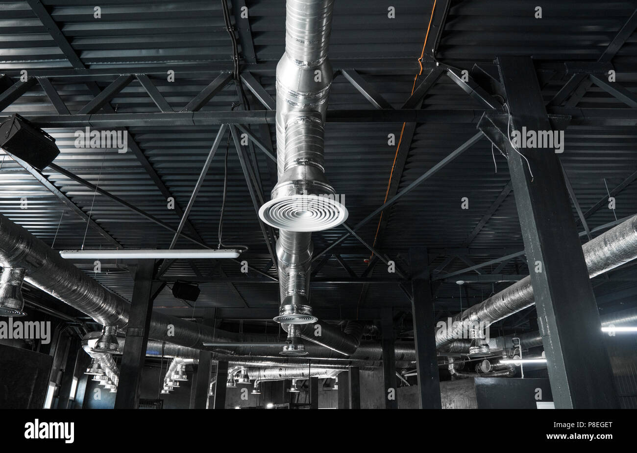 Ventilation system on the ceiling of large buildings. Ventilation pipes ...