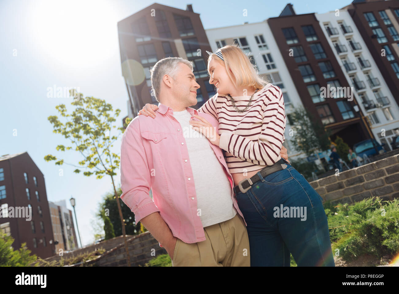 Nice happy couple looking at each other Stock Photo - Alamy