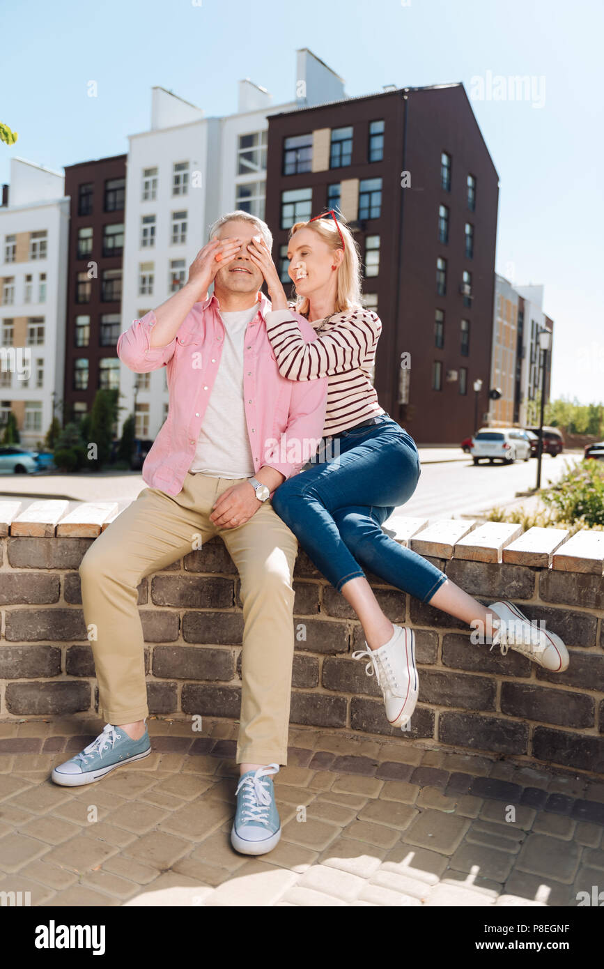 Positive nice woman preparing a surprise Stock Photo - Alamy