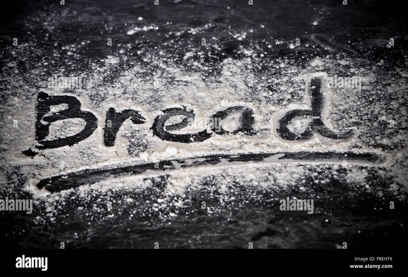 Bread written in flour Stock Photo - Alamy