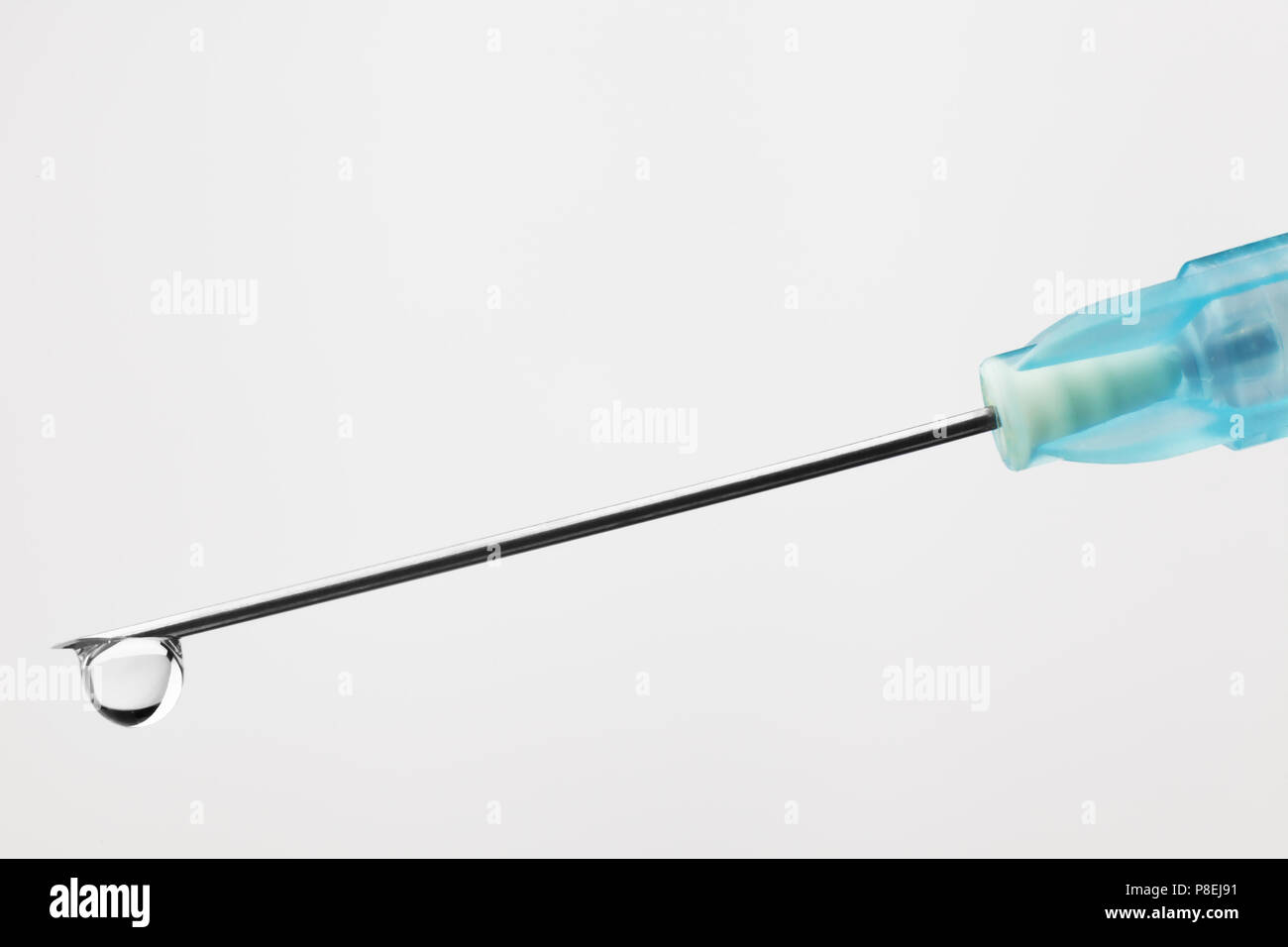 syringe needle close up on a white background with a medicine dr Stock ...