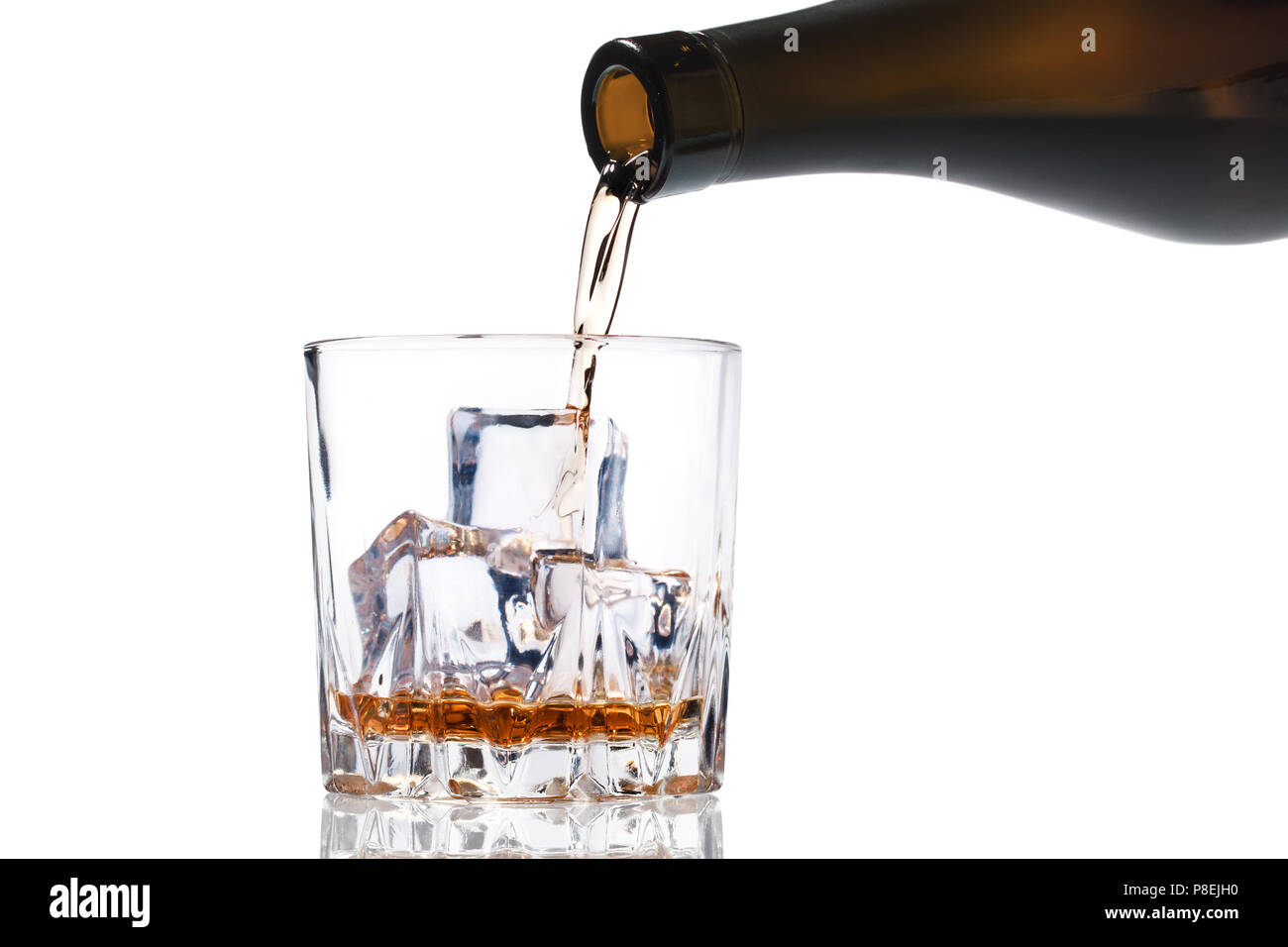 Pouring Cold Whiskey Into The Glass Isolated On White Background Stock ...