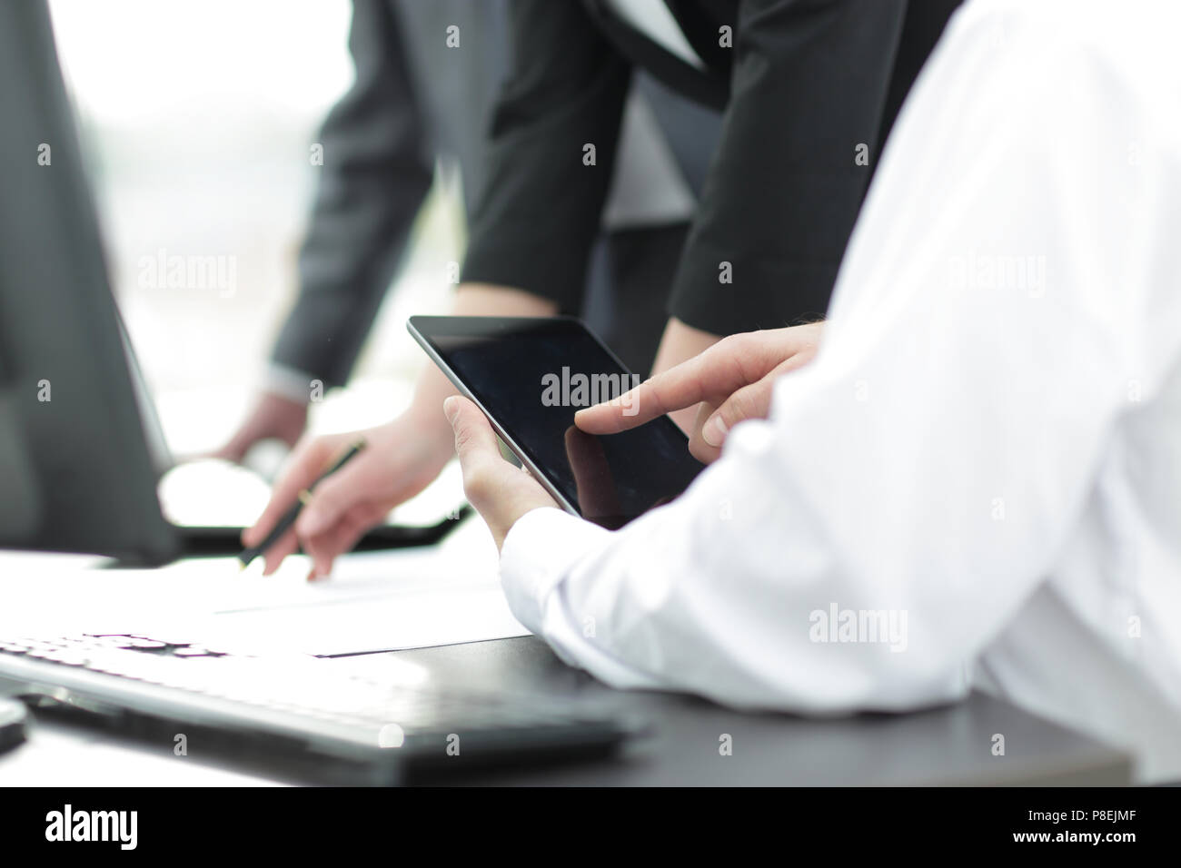 Image of human hand pointing at touchscreen in working environme Stock ...