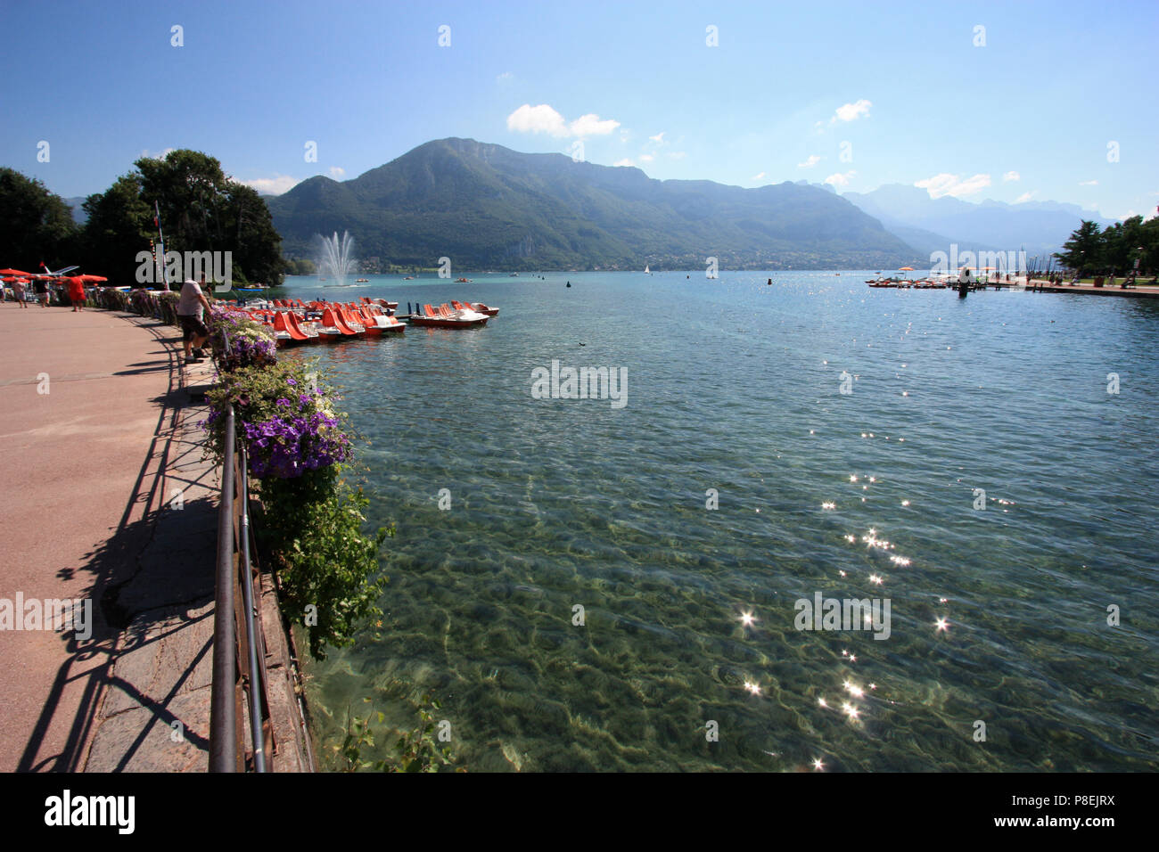 Lake Annecy and the Thiou river estuary in Annecy, Haute Savoie, France ...