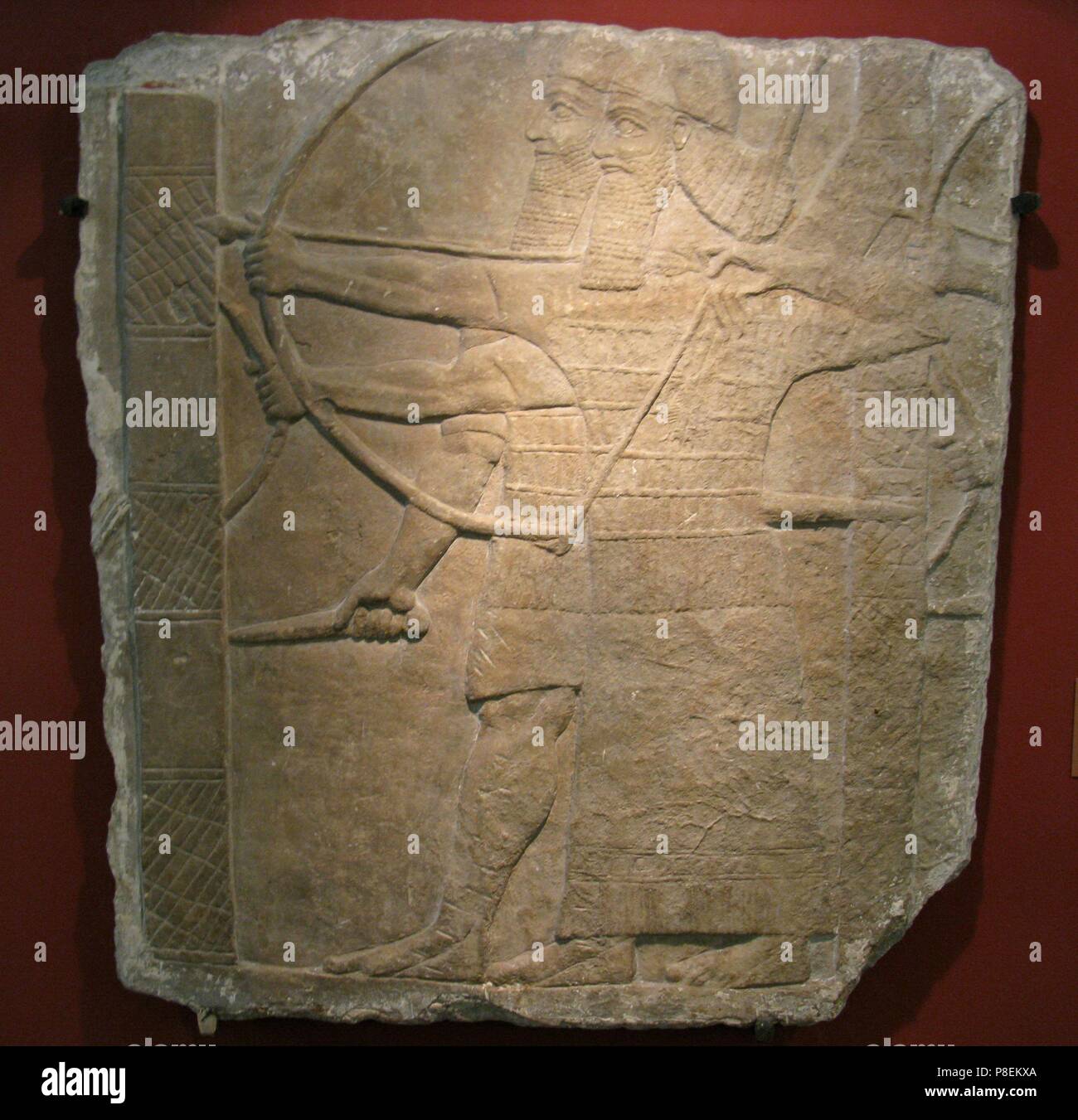 Assyrian warriors. Detail from a relief from the palace of Tiglath ...