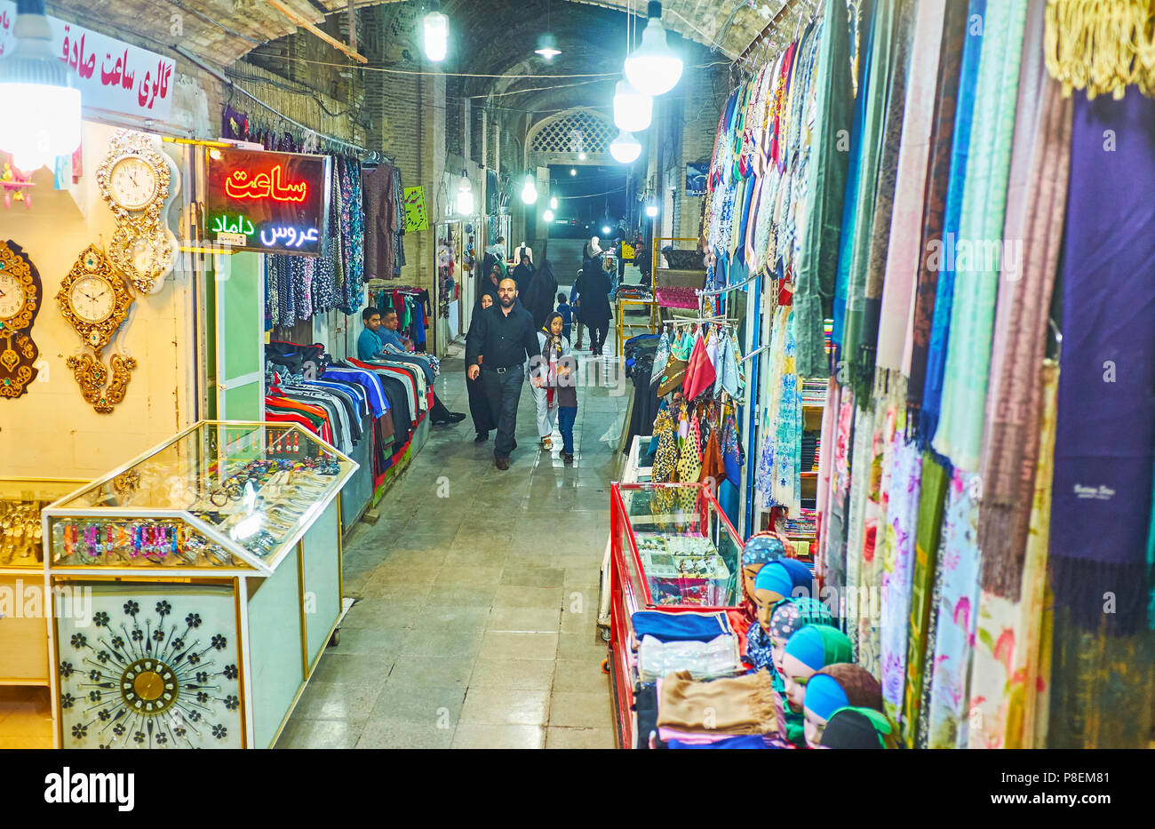 KERMAN, IRAN - OCTOBER 15, 2017: The narrow gallery with different ...