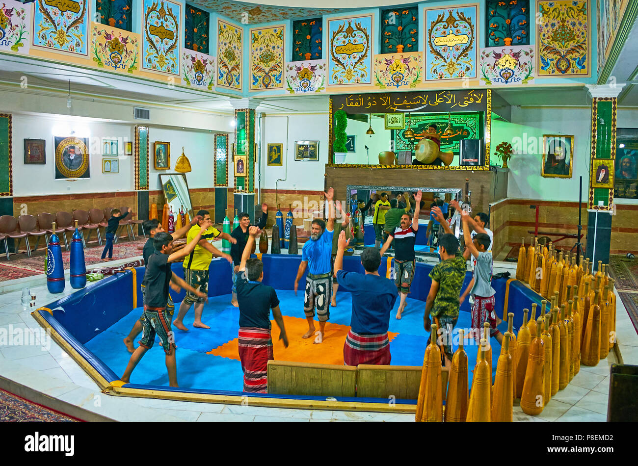 KERMAN, IRAN - OCTOBER 15, 2017: Athletes do the warm-up exercises ...