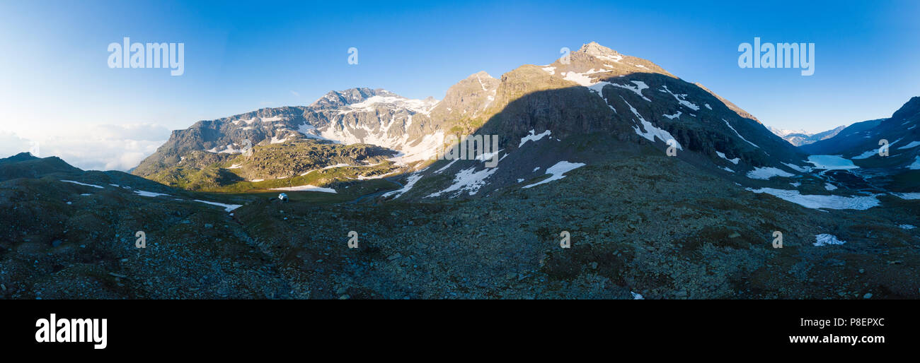 High altitude alpine landscape with majestic rocky mountain peaks ...