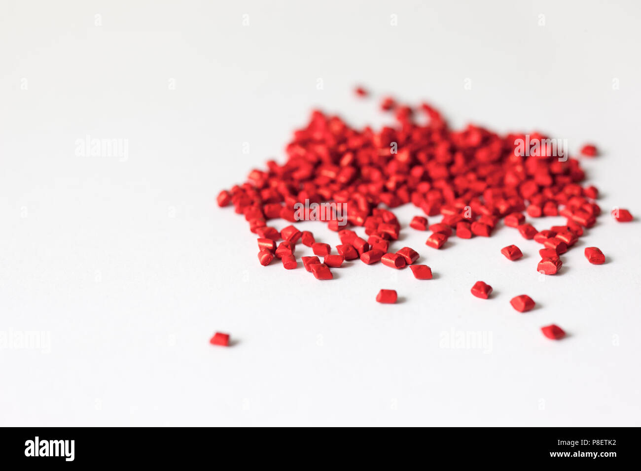 Granules of different shapes for the production of multi-colored ...