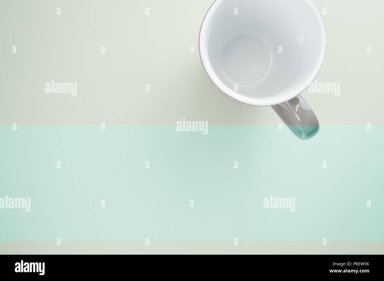 simple empty ceramic mug with white interior and color bands copy space ...