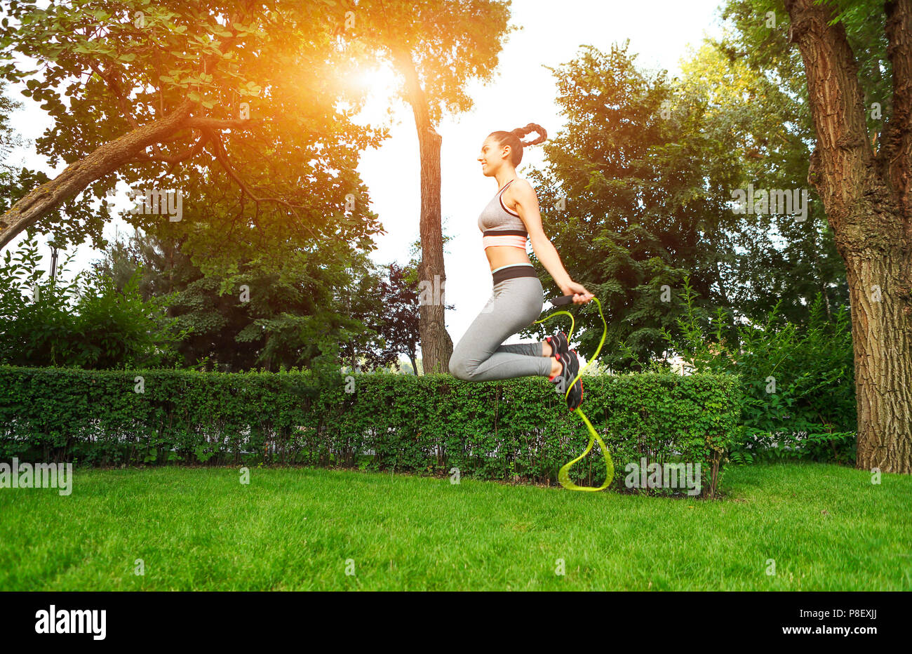 Woman rope jumping outdoor hi-res stock photography and images - Alamy