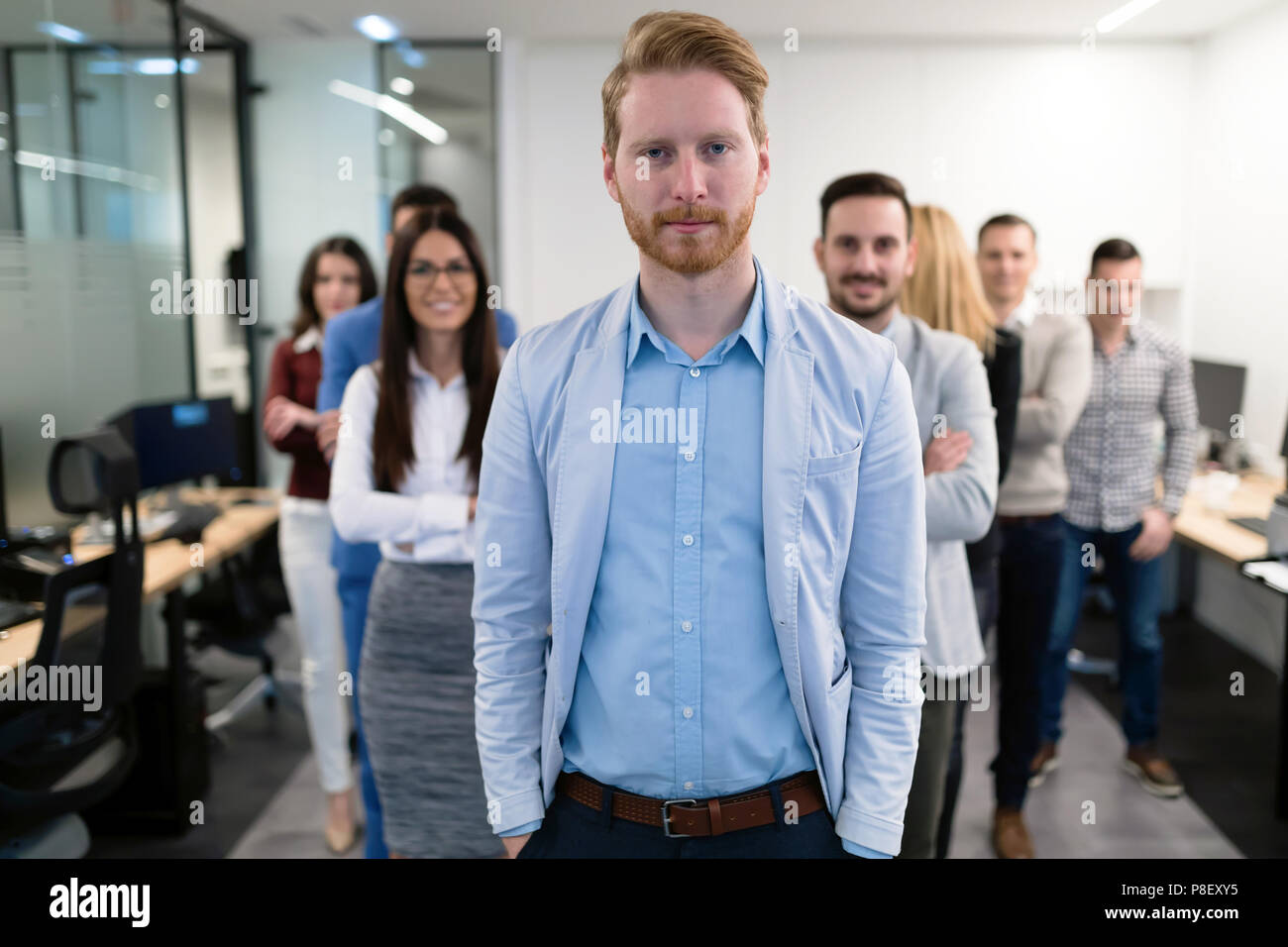 Successful team of young perspective businesspeople in office Stock ...