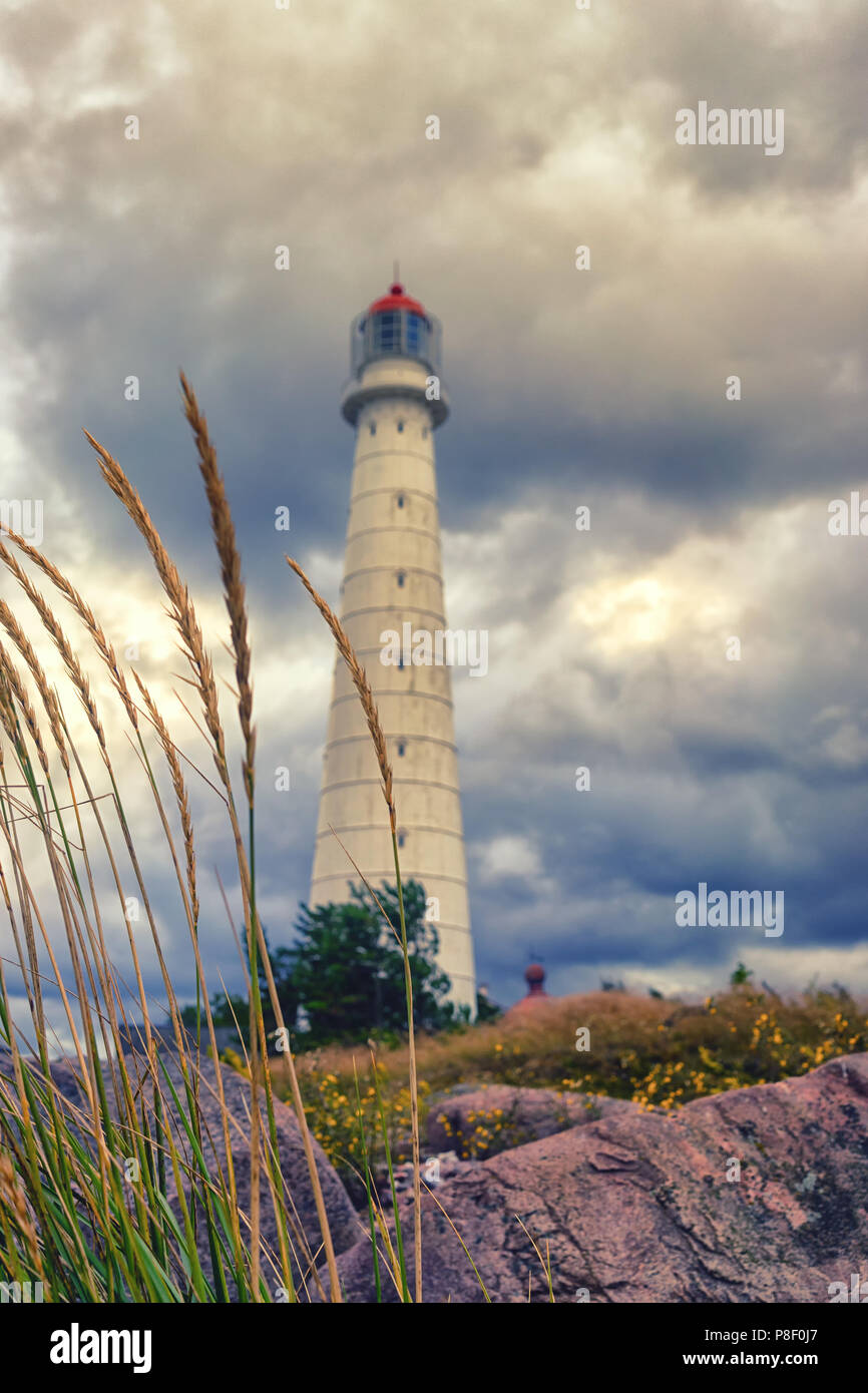 An ancient cast-iron lighthouse of the 19th century Tahkuna Tuletorn on ...