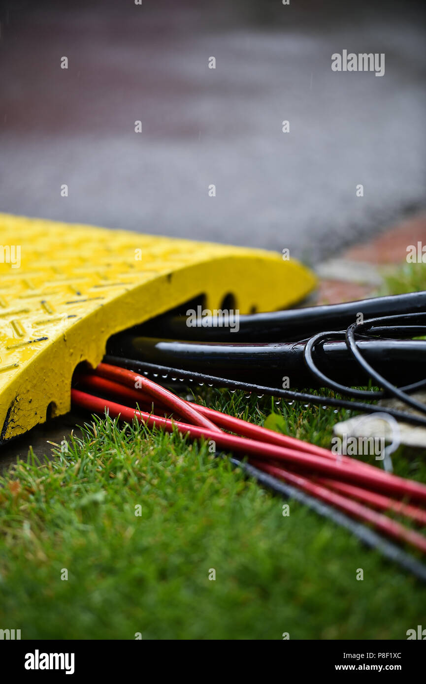Closeup shot during heavy rain on industrial electric cables Stock ...