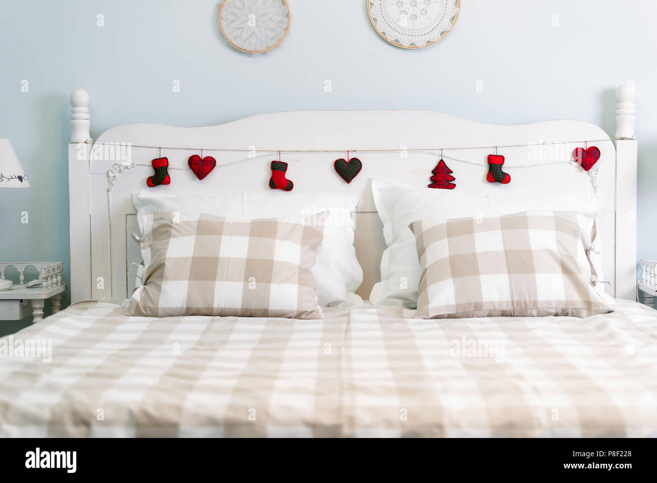Picture of romantic nice decorated bed in bedroom Stock Photo - Alamy