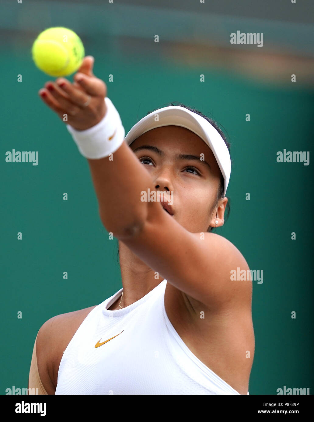 Emma Raducanu serves on day nine of the Wimbledon Championships at the ...