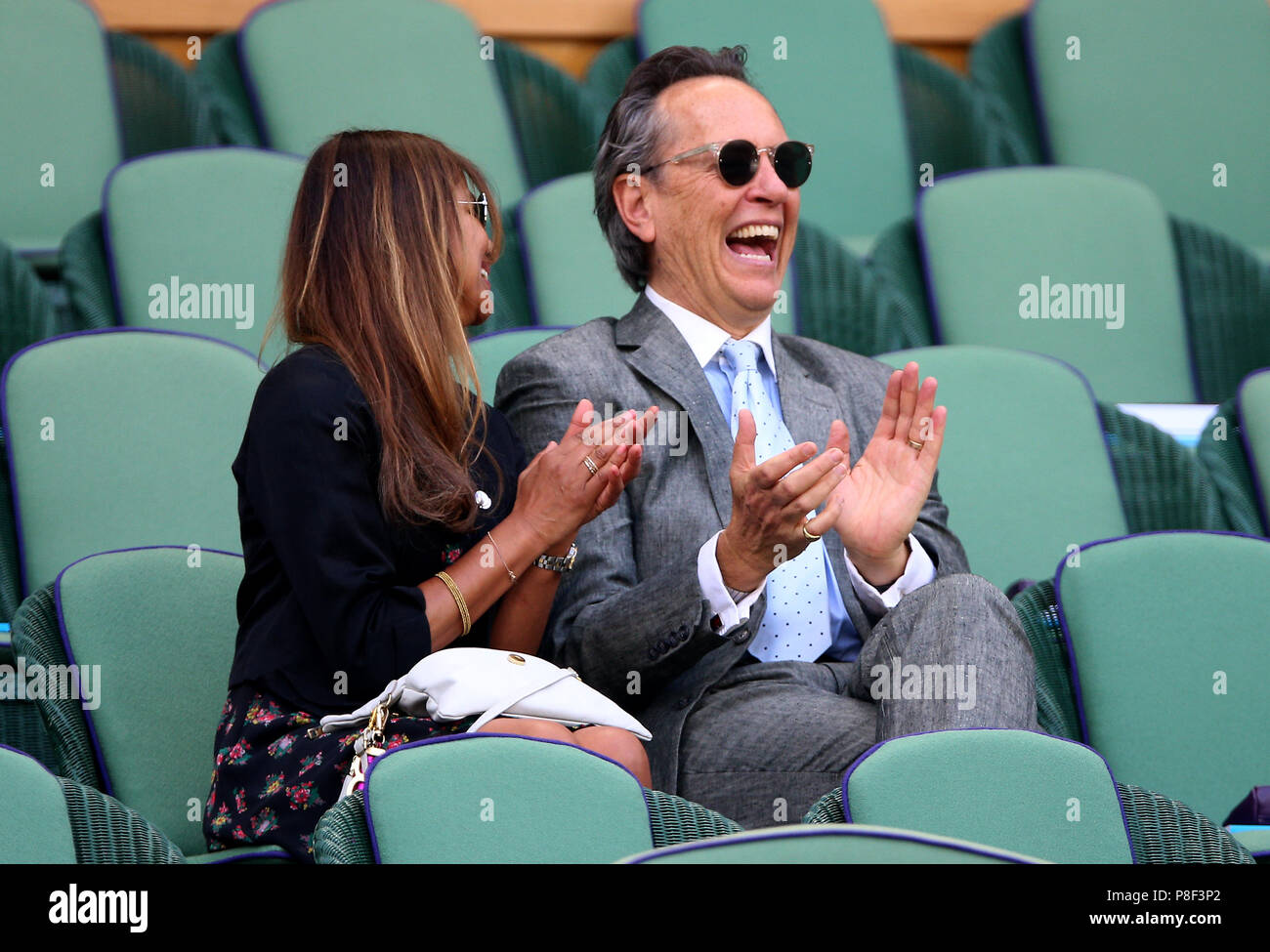 Richard E. Grant and Binti Velani in the royal box on centre court on ...