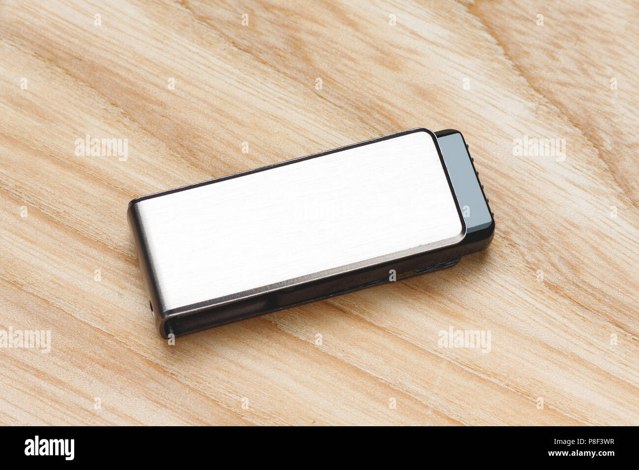 Flash memory drive on wooden desk background Stock Photo - Alamy