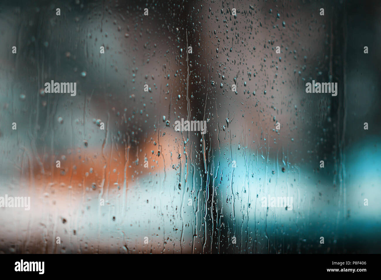 Rainy traffic. View from wet window of car Stock Photo - Alamy
