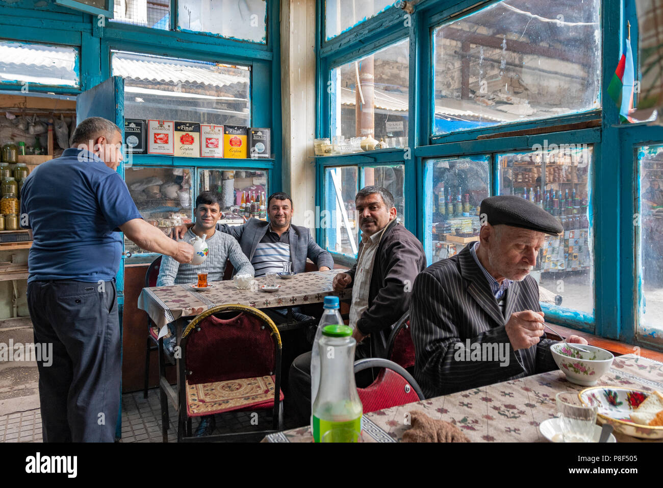 Small restaurant inside The Teze Bazaar in Baku,Azerbaijan Stock Photo ...