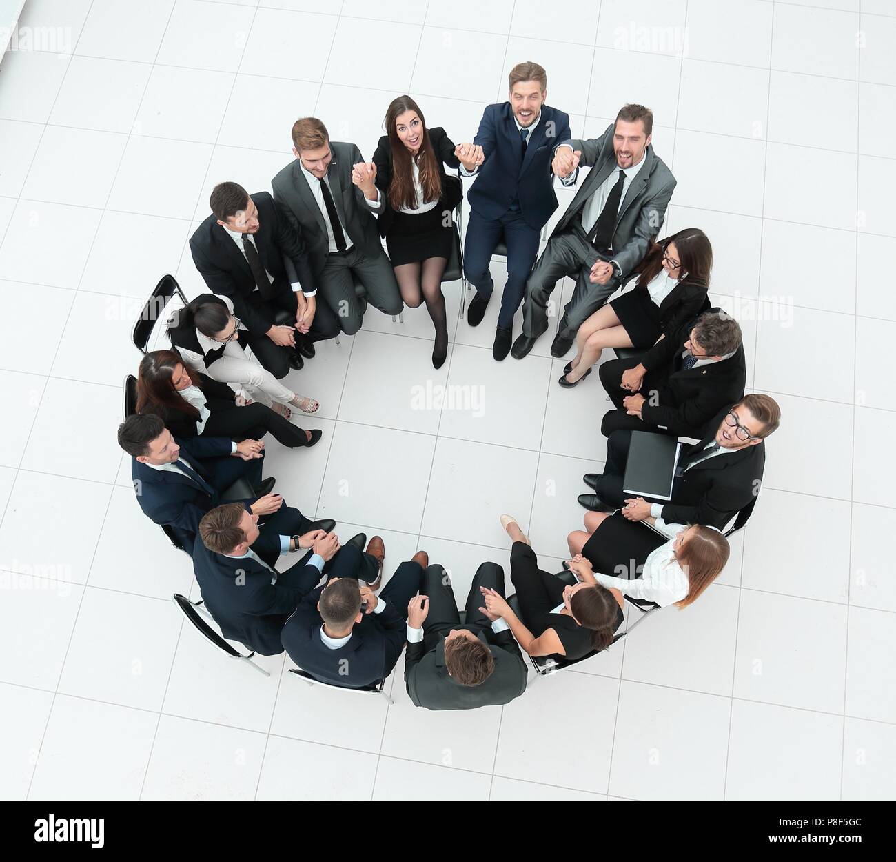 concept of team building .large successful business team sitting in a ...