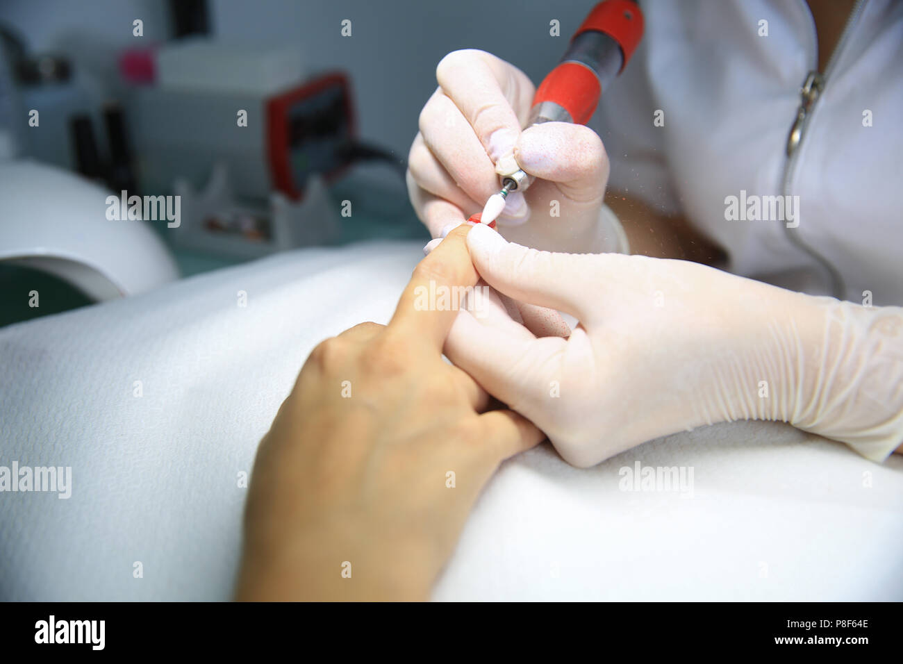 Removing fingernail hi-res stock photography and images - Alamy