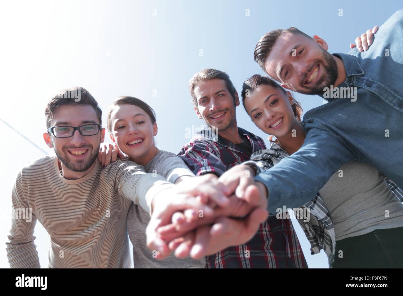 College Students Teamwork Stacking Hand Concept Stock Photo - Alamy