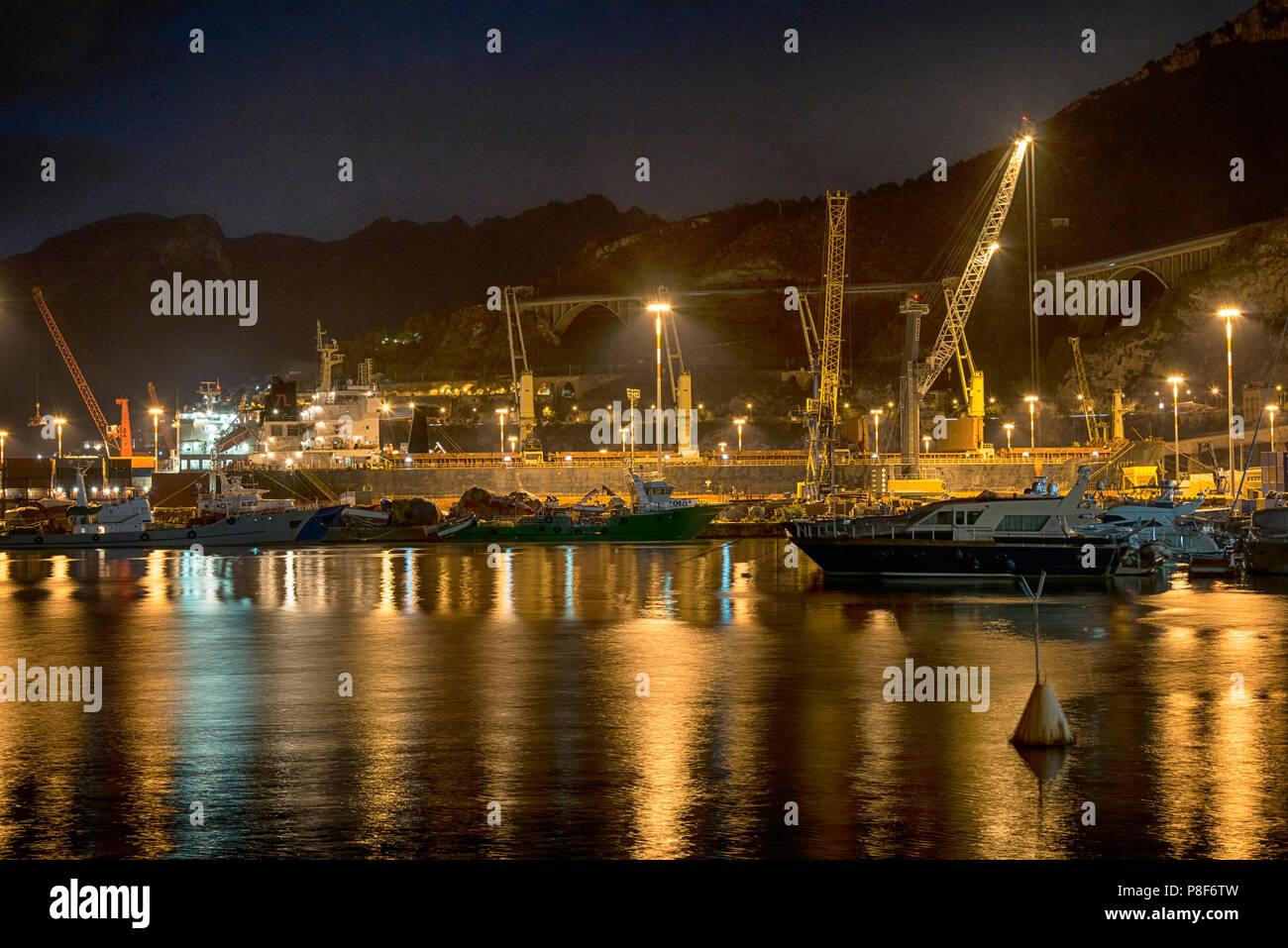 View of the night port Stock Photo - Alamy