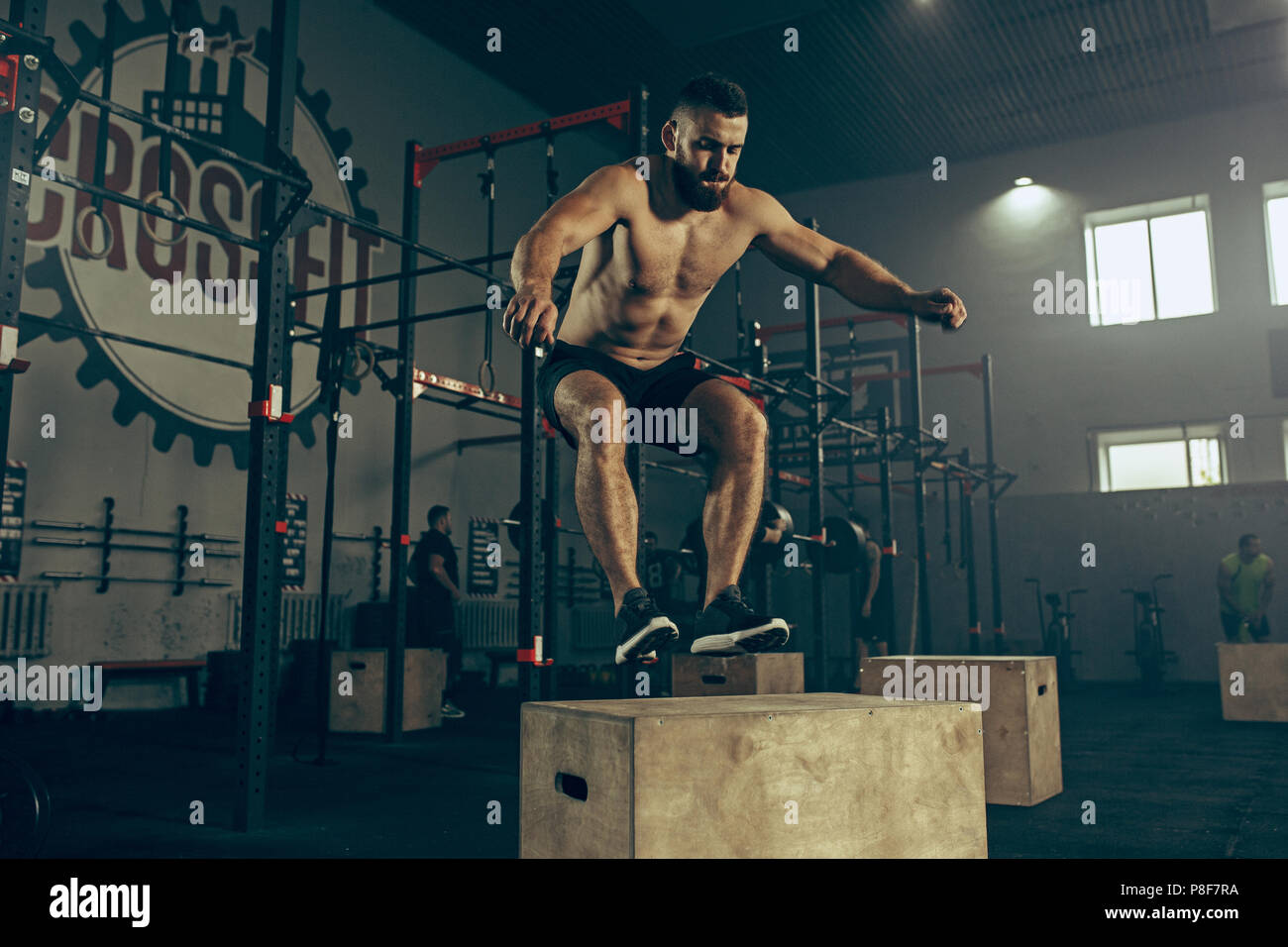 Male athlete jumping during workout hi-res stock photography and images ...