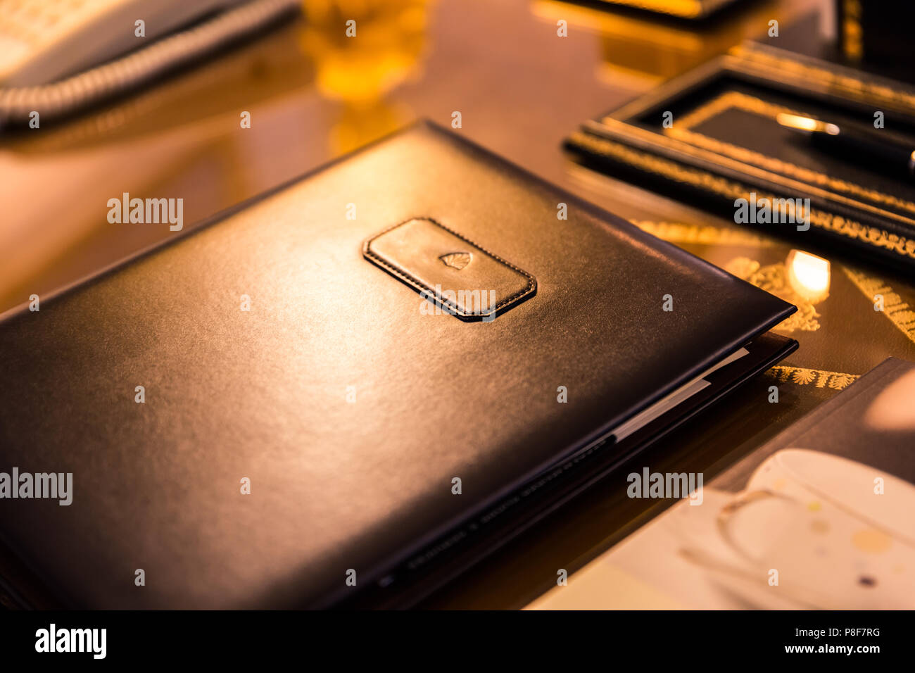 Genuine Brown Leather Folder on Shiny Desk Surface Stock Photo - Alamy