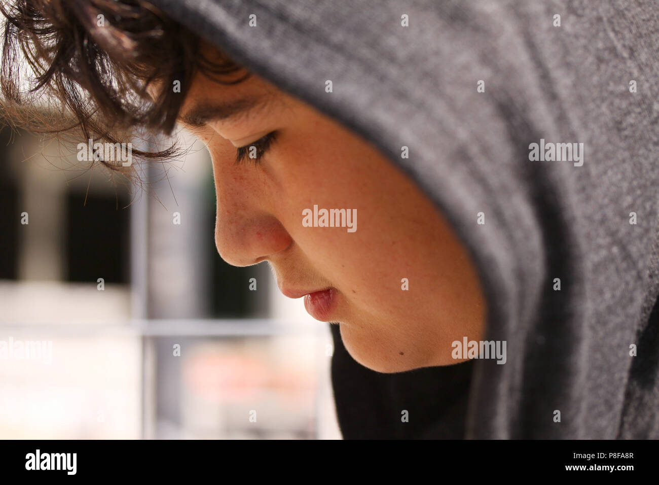 Sad boy hood hi-res stock photography and images - Alamy