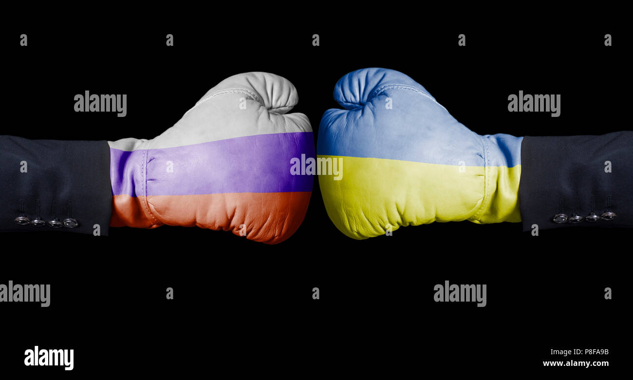 Boxing gloves with Russian and Ukrainian flag. Russia versus Ukraine ...