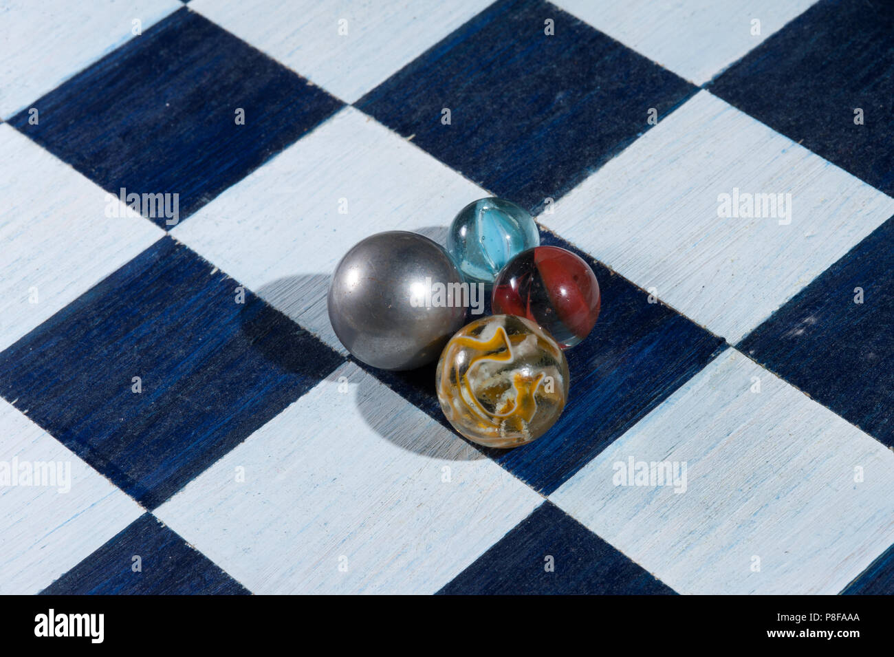 glass balls on chess board Stock Photo - Alamy