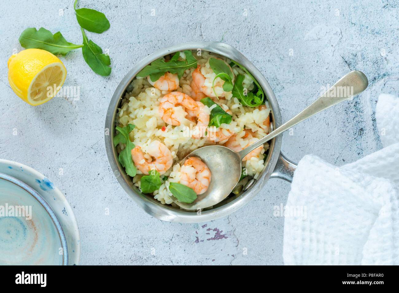 Prawn, fennel and rocket risotto - top view Stock Photo - Alamy