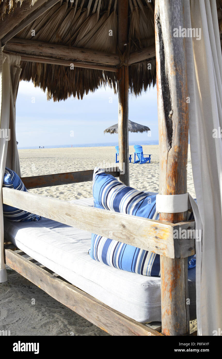 tropical outdoor beach bed luxury relaxation glamping palm thatched ...