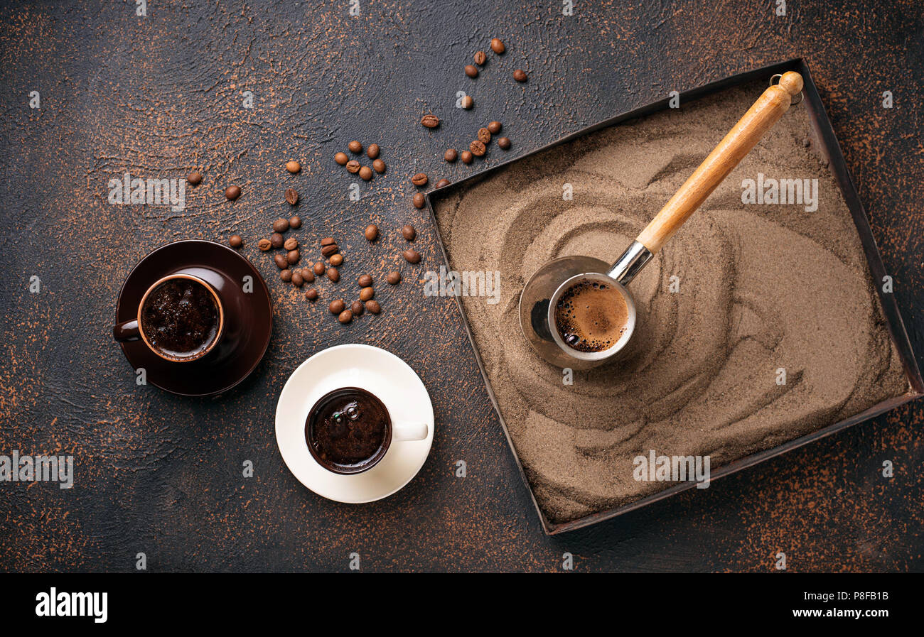 Traditional turkish coffee prepared on hot sand Stock Photo - Alamy
