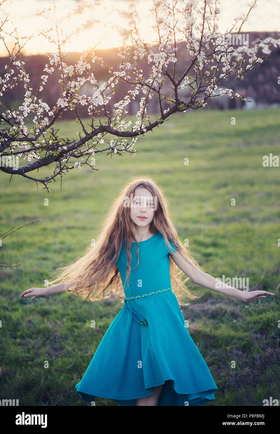 Child spinning in field hi-res stock photography and images - Alamy