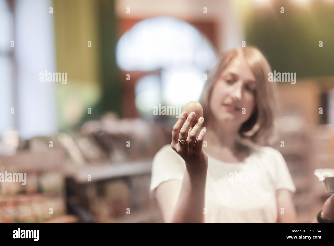 Checking eggs hi-res stock photography and images - Alamy