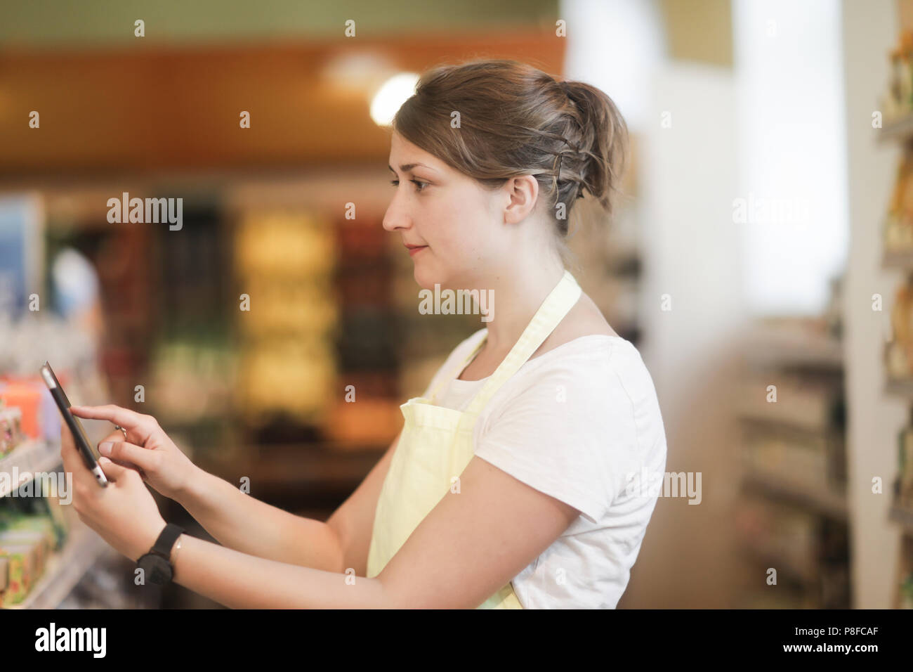 Checking products hi-res stock photography and images - Alamy