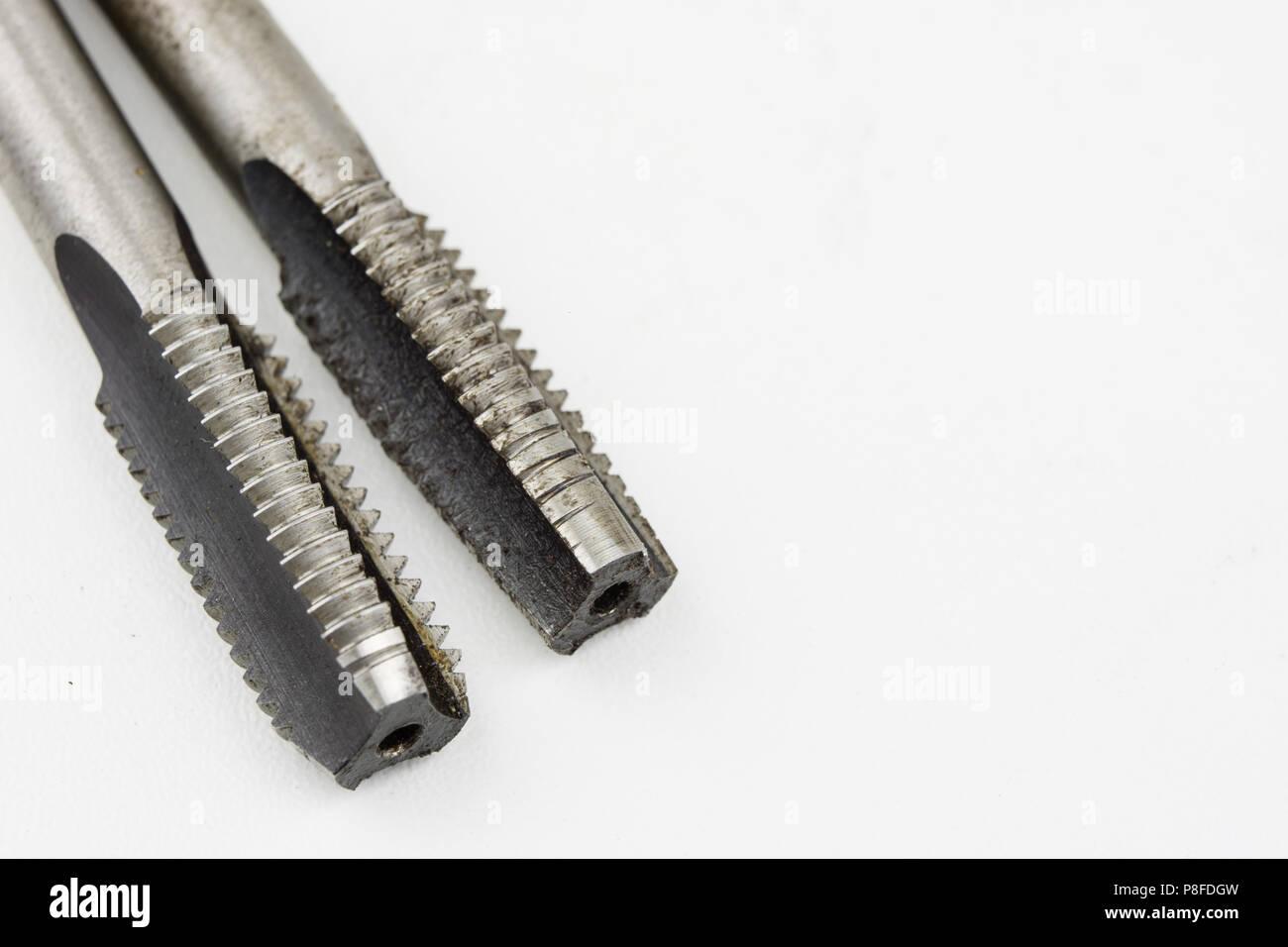 Device for making threads in a screw. Metalworking accessories. White ...