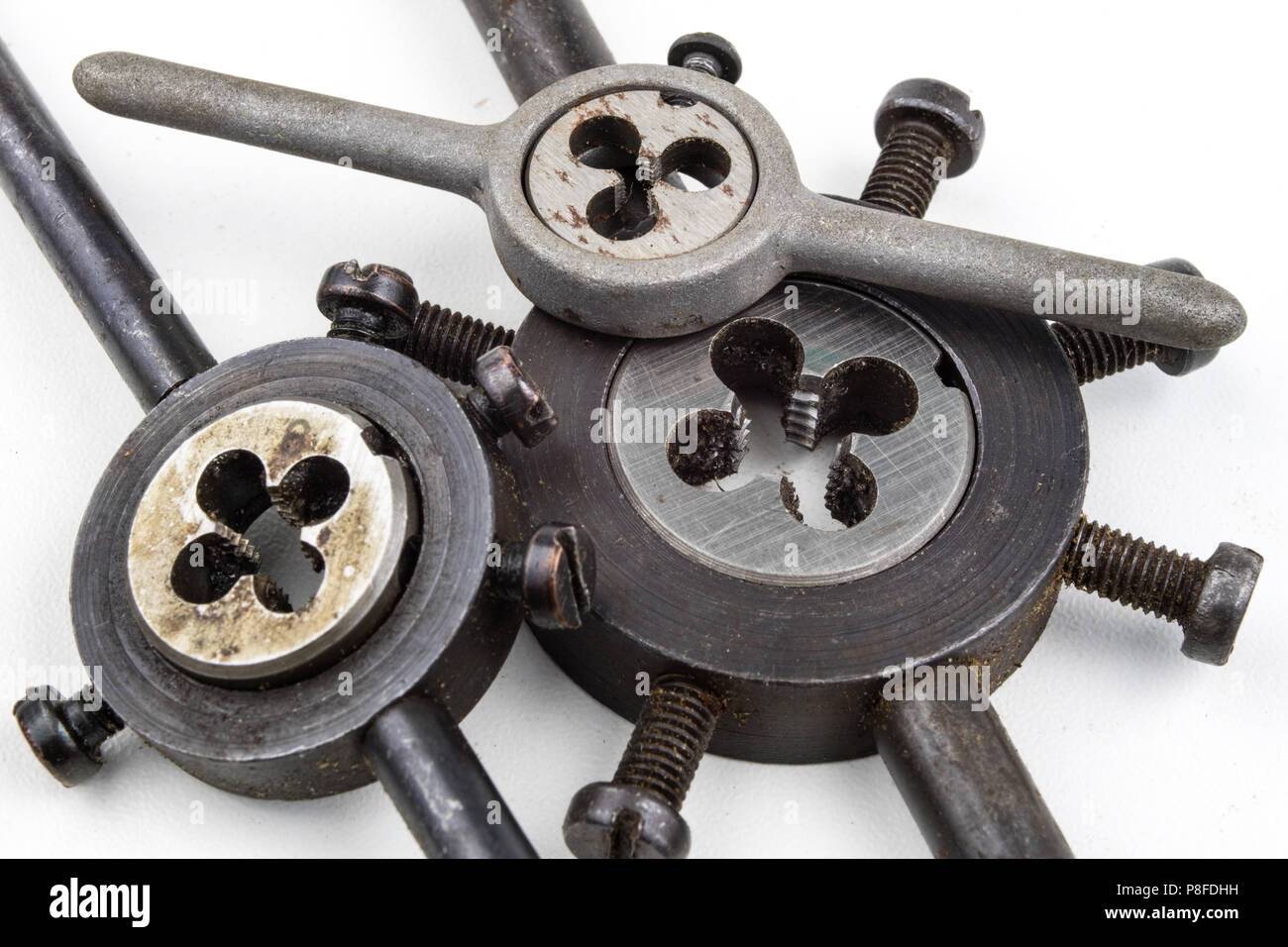 Device for making threads in a screw. Metalworking accessories. White ...