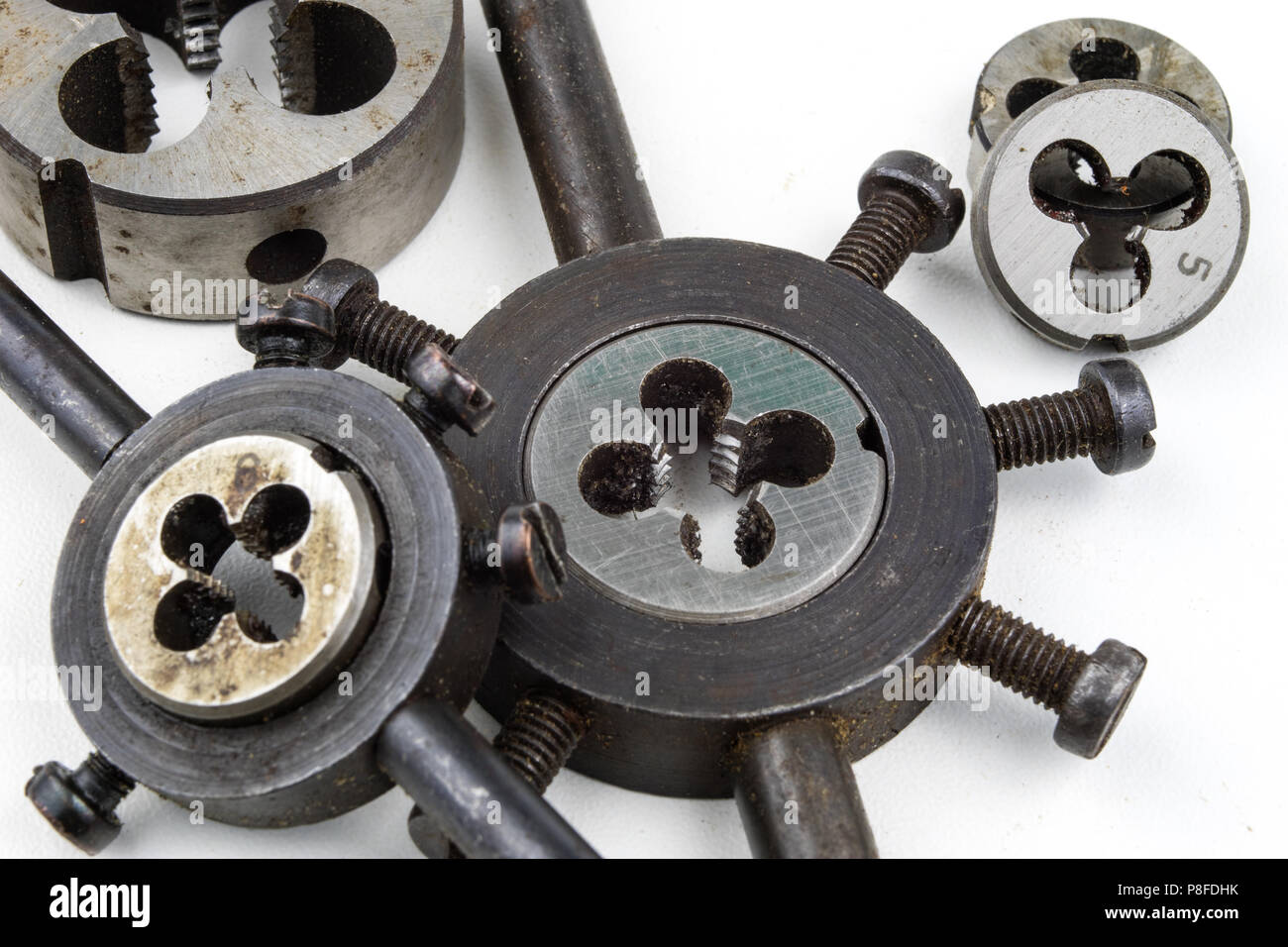 Device for making threads in a screw. Metalworking accessories. White ...