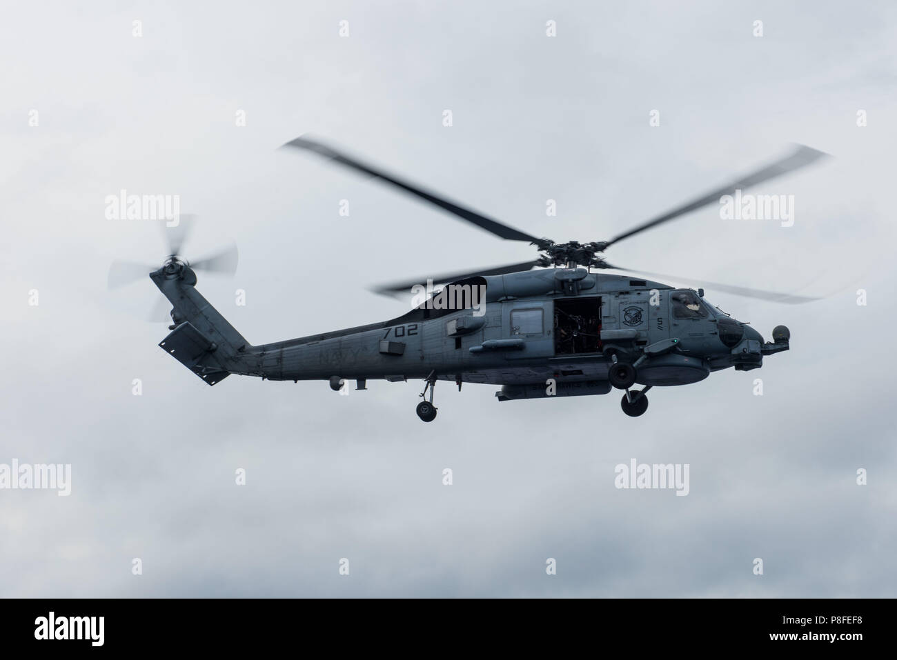 180711-N-OY799-0600 PHILIPPINE SEA (July 11, 2018) An MH-60R Sea Hawk ...