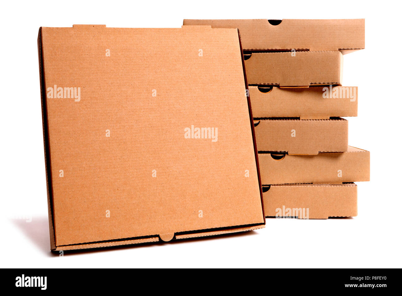 Stack of plain brown pizza boxes with one front facing box for display ...