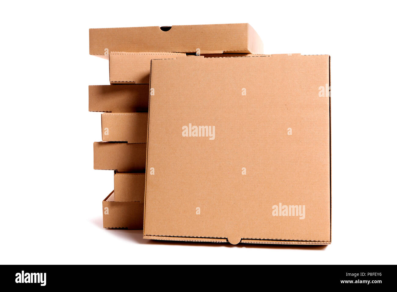 Stack of plain brown pizza boxes with one front facing box for display ...