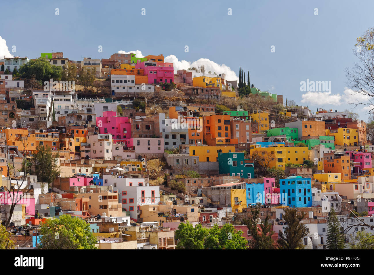 A scenic, colorful neighborhood perched on a hill in the historic city ...