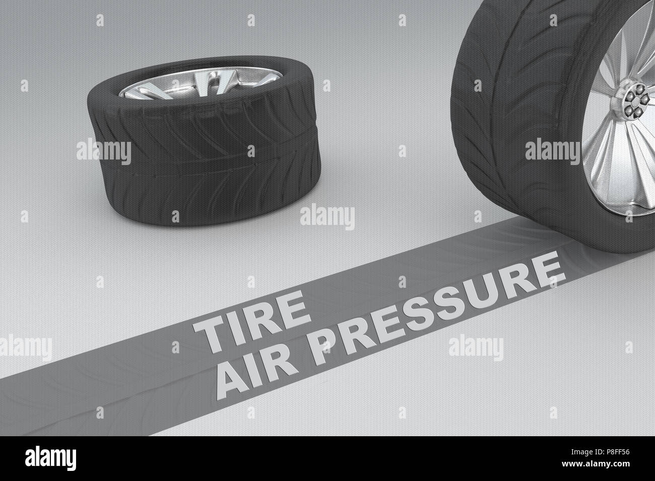 TIRE AIR PRESSURE conceptual image of 3D rendered wheels with tires and ...