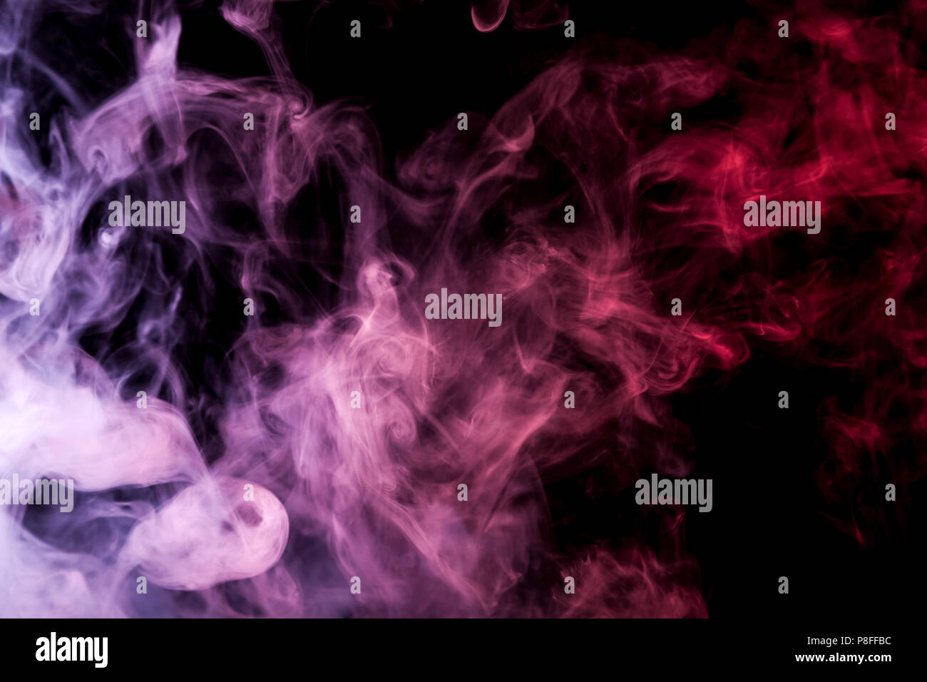 Colorful pink and red smoke on a black isolated background. Background ...