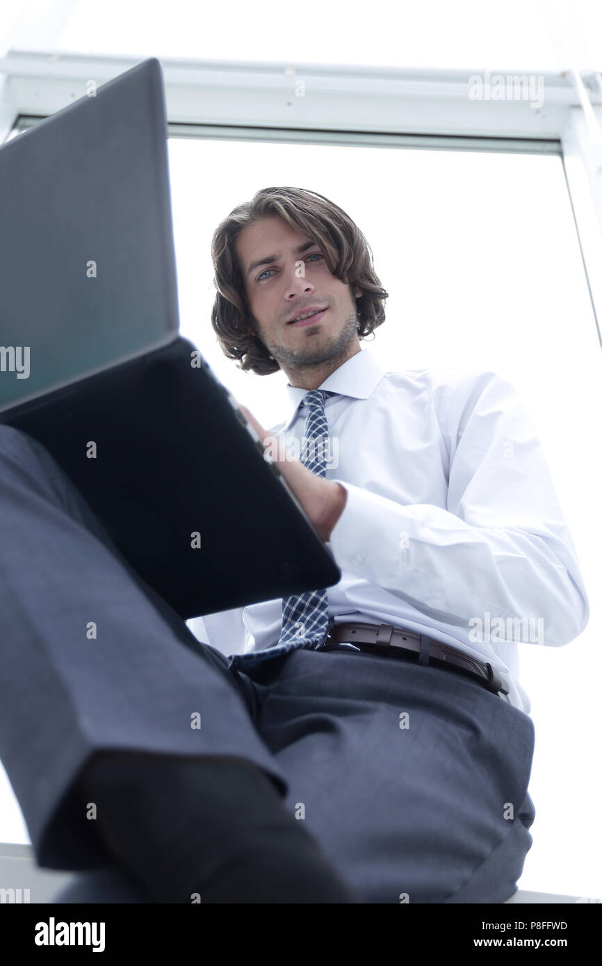 closeup.a successful employee working with a laptop Stock Photo - Alamy