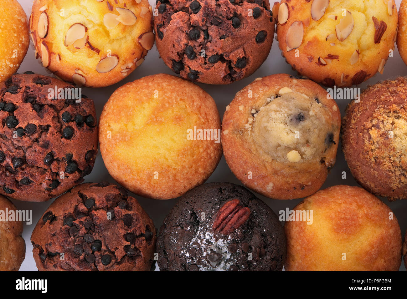 Various muffin cakes top view Stock Photo - Alamy